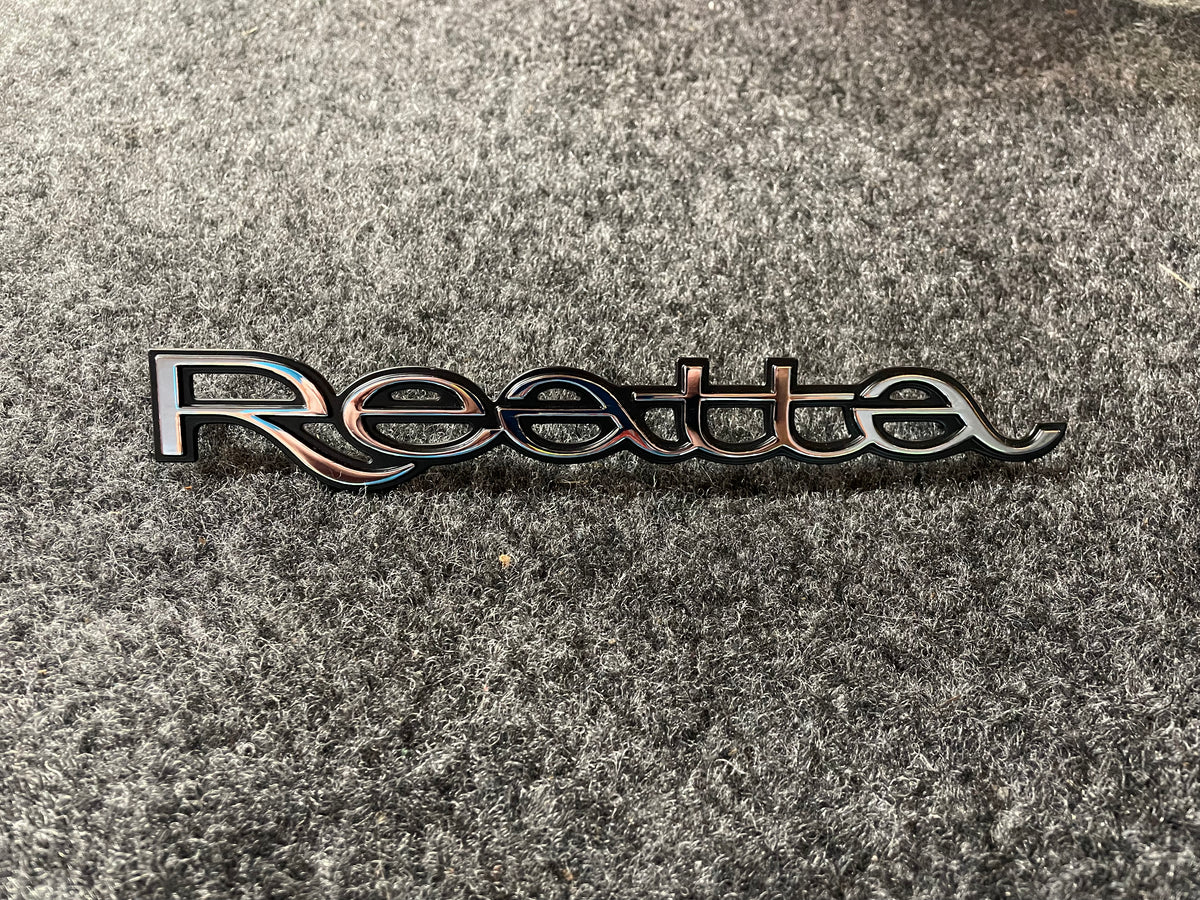 NOS Rear Script Emblem – East Coast Reatta Parts